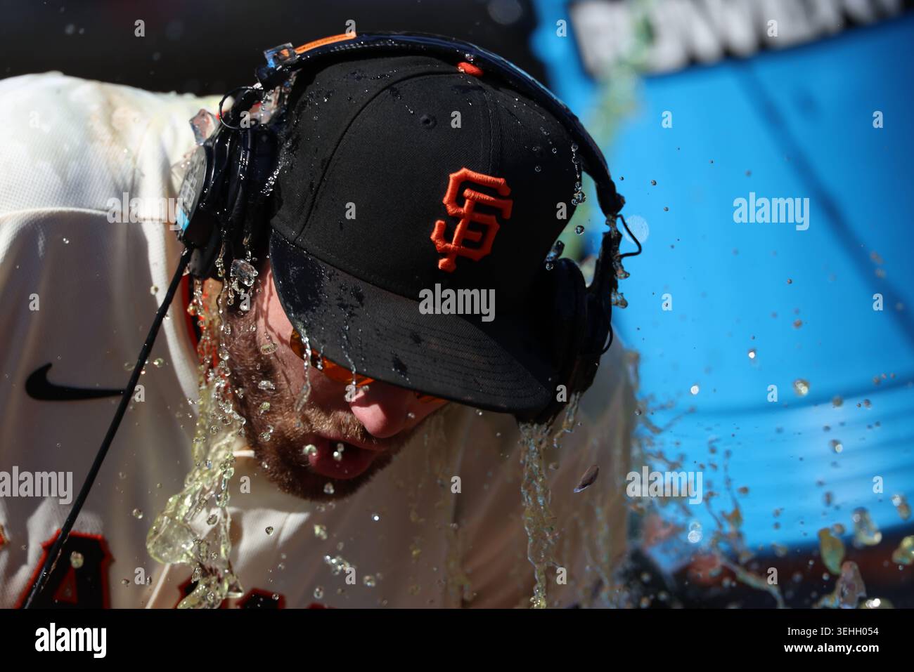 San Francisco Giants' Casey Schmitt is doused by a teammate after their ...