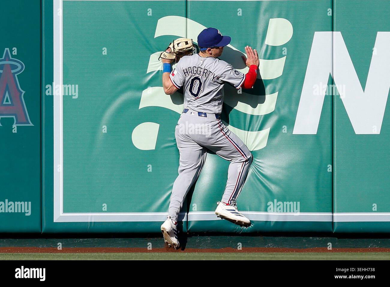 Texas Rangers center fielder Sam Haggerty catches a fly ball hit by Los ...