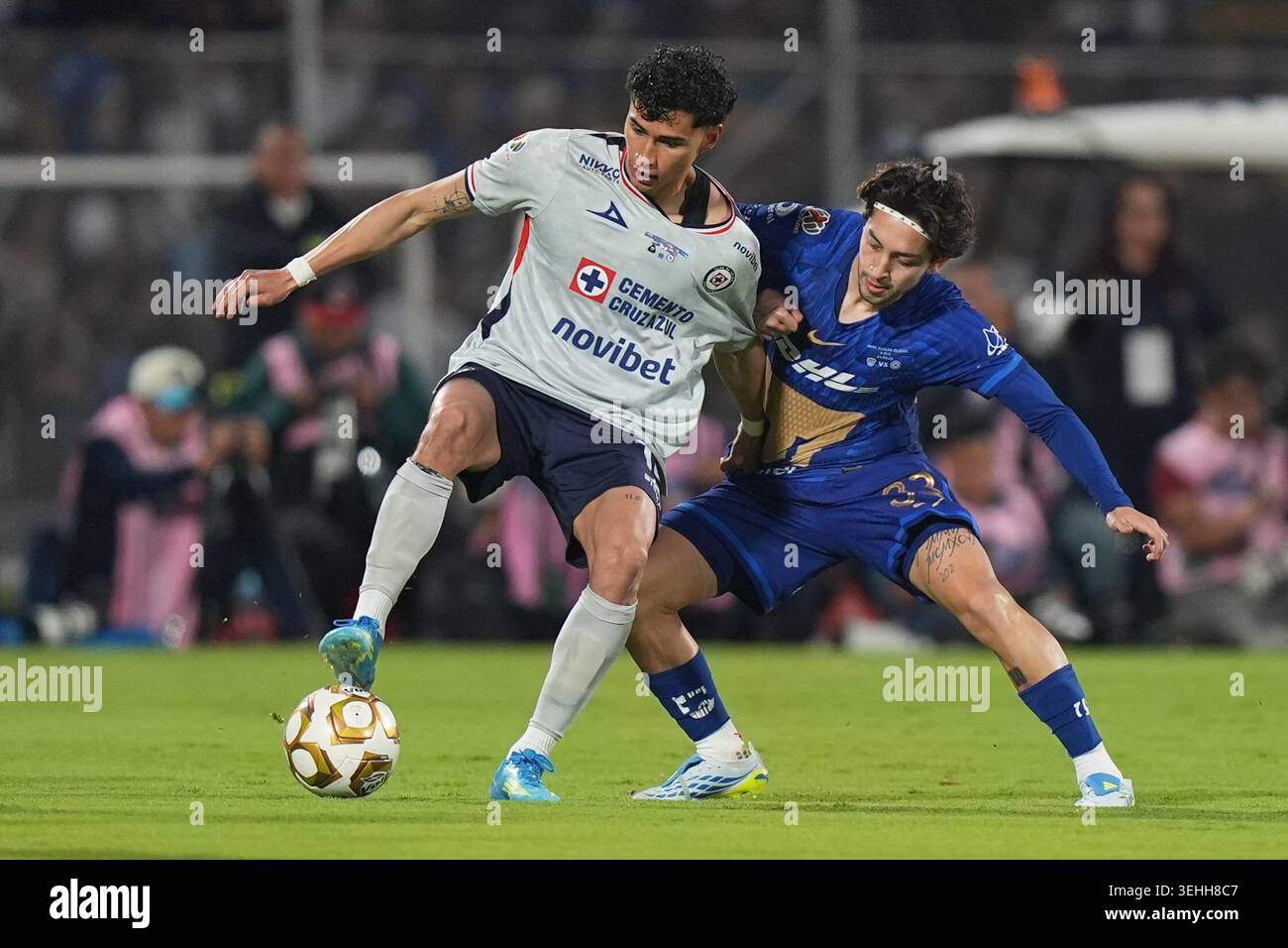 Pumas' Jordan Carillo, right, and Cruz Azul's Angel Marquez compete for ...