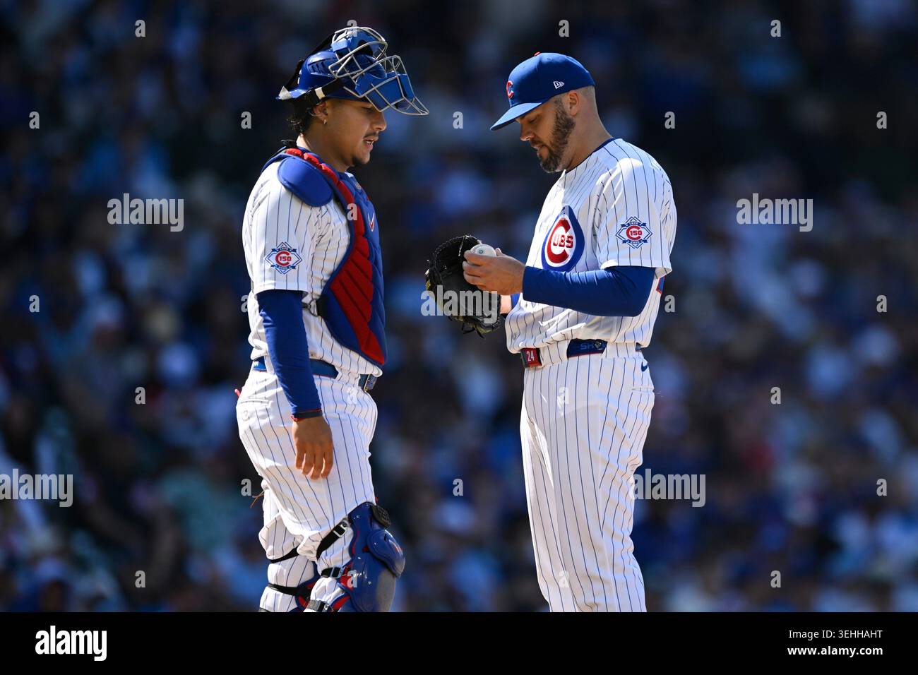 Chicago Cubs relief pitcher Caleb Theilbar, right, talks with catcher ...