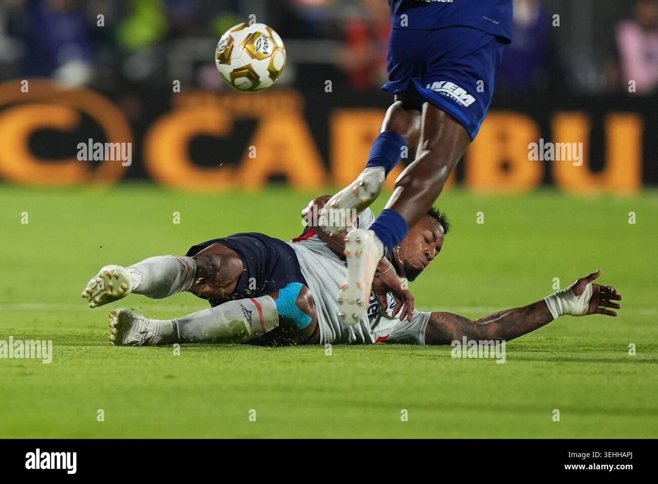 Cruz Azul's Willer Ditta slides in the tackle of Pumas' Alvaro Angulo ...