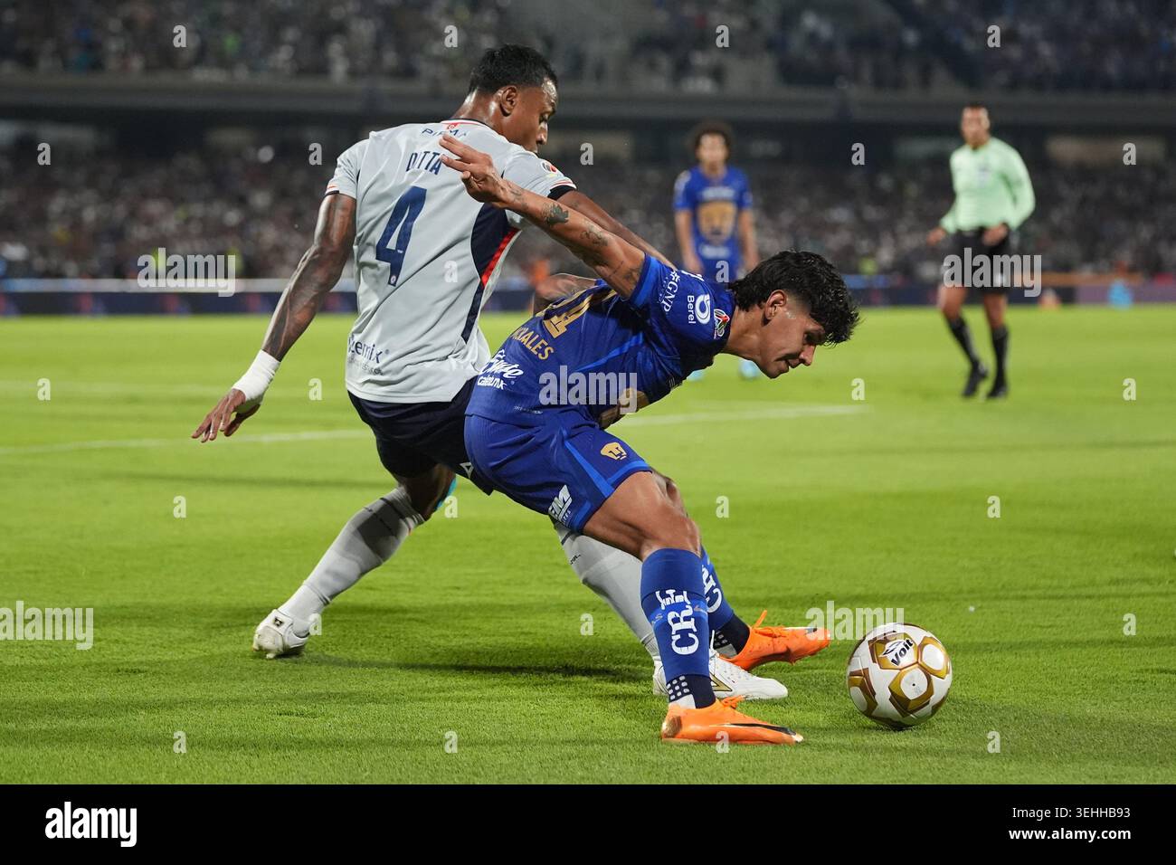 Pumas' Robert Morales, right, protects the ball from Cruz Azul's Willer ...