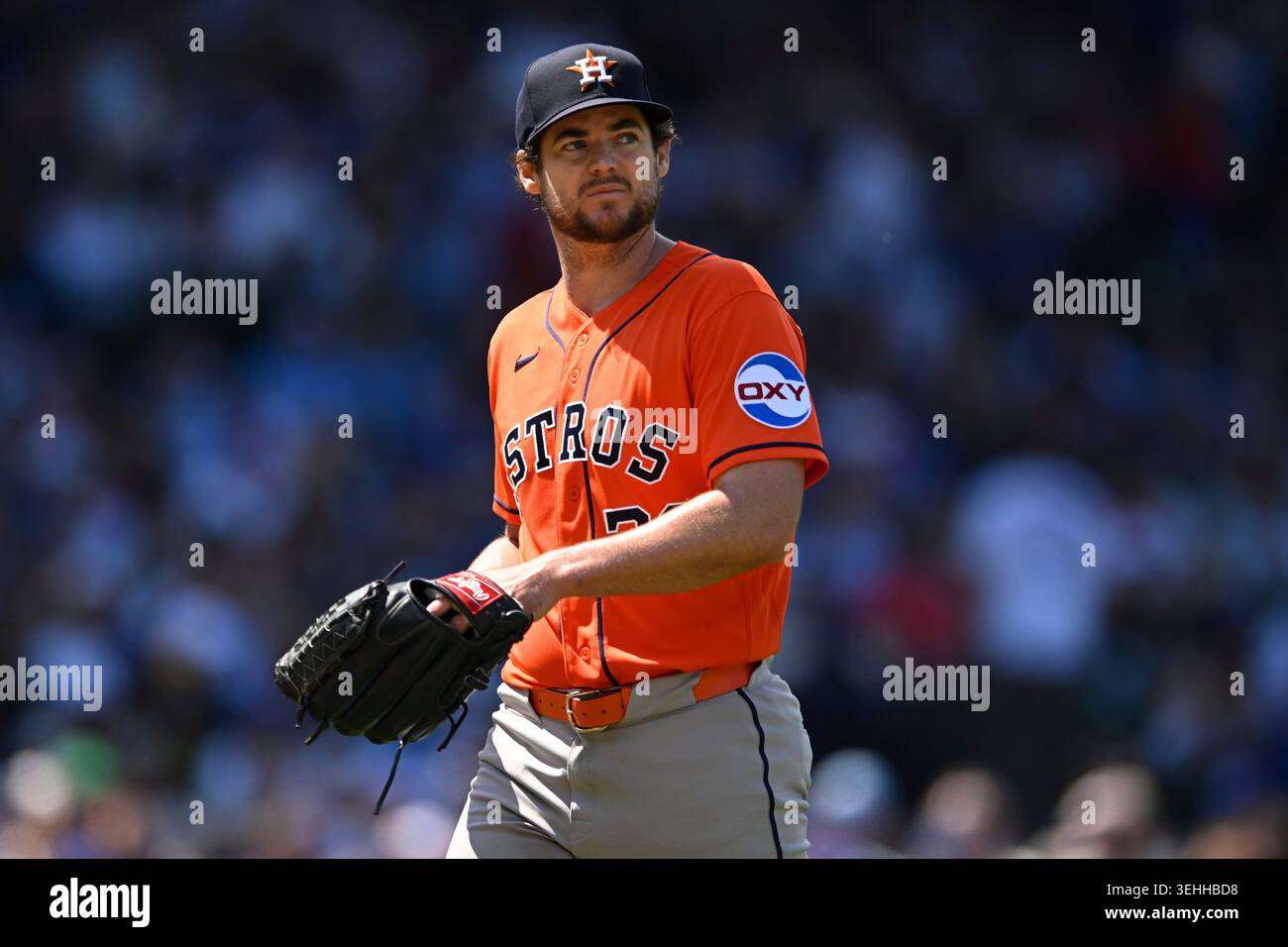 Houston Astros starting pitcher Peter Lambert walks to the dugout ...