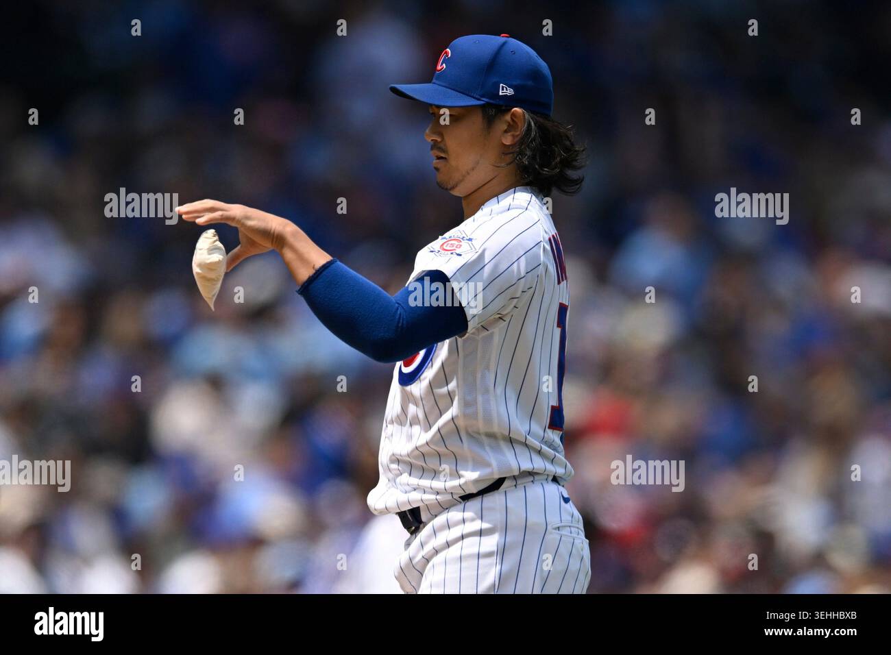 Chicago Cubs starting pitcher Shota Imanaga prepares to pitch during ...