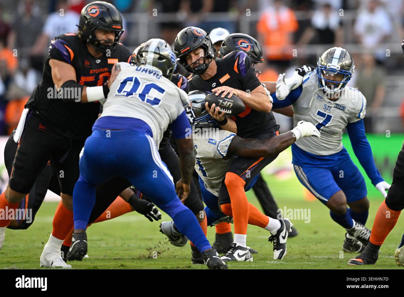 Orlando Storm quarterback Jack Plummer, center, is sacked by St. Louis ...