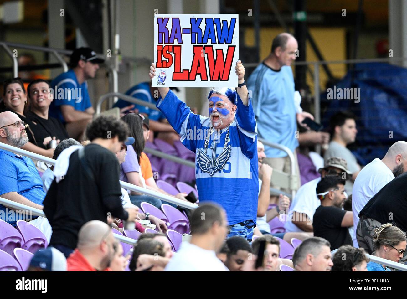 A fan cheers in the stands before a UFL football game between the ...