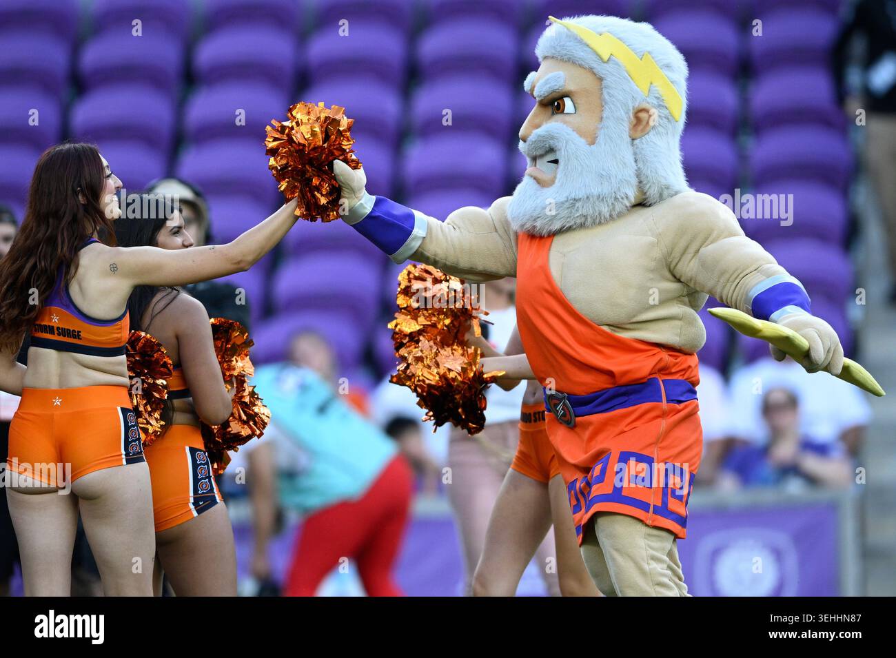 Orlando Storm mascot Kratos, right, greets cheerleaders on the field ...