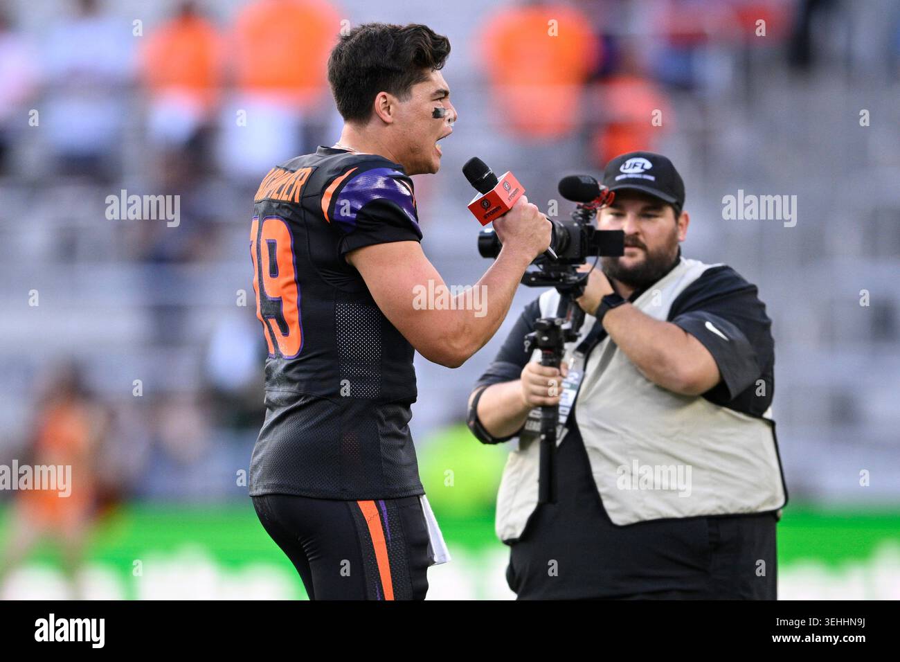 Orlando Storm quarterback Hank Bachmeier (19) pumps up the crowd before ...