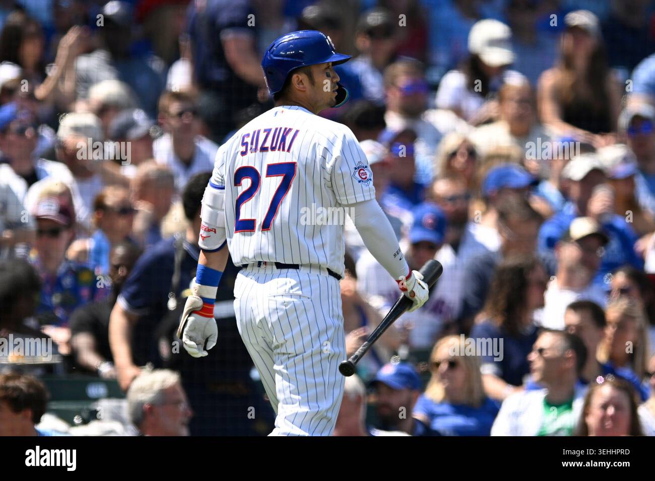 Chicago Cubs' Seiya Suzuki reacts after striking out during the third ...