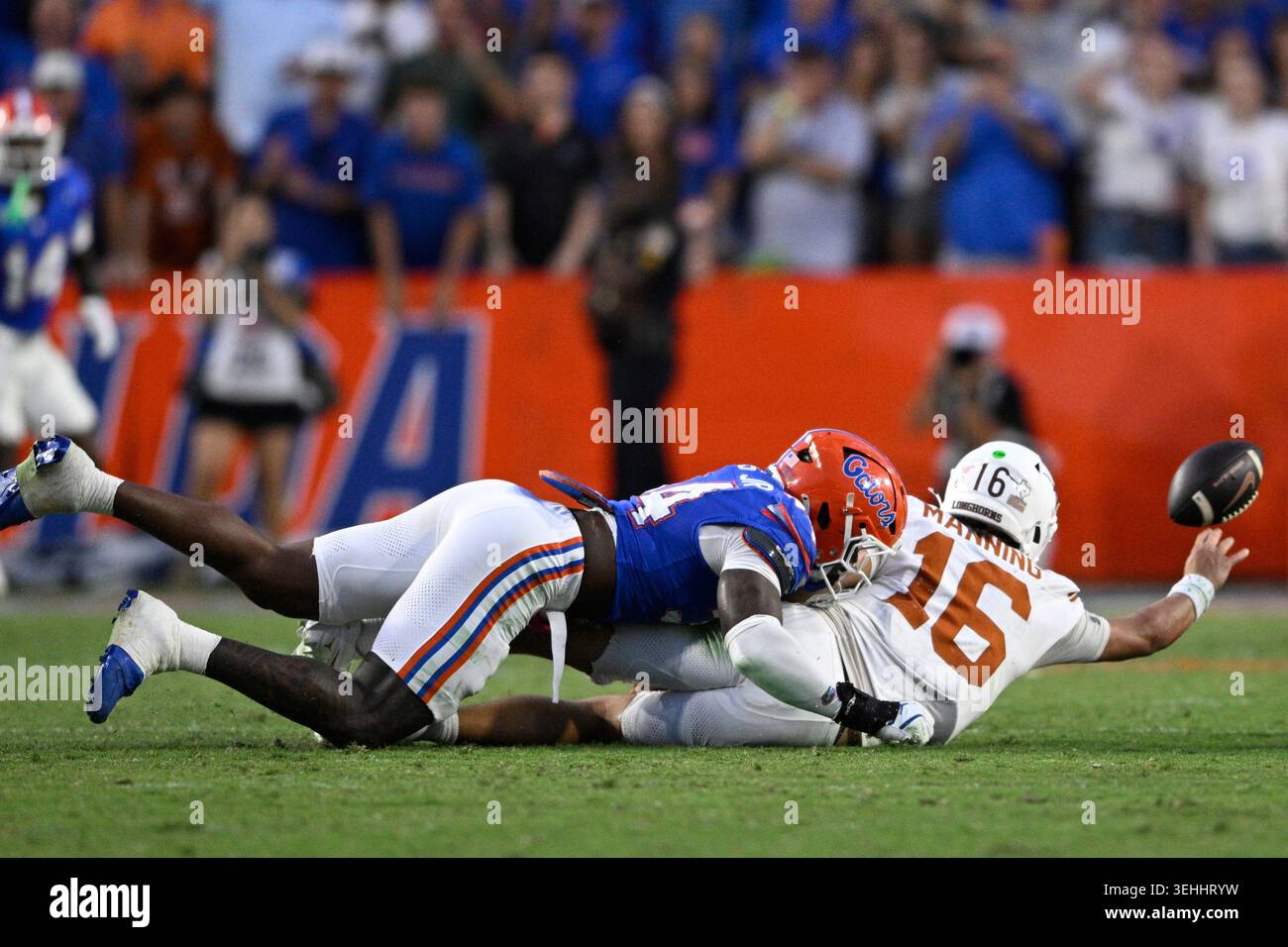 Texas quarterback Arch Manning (16) is sacked by Florida defensive end ...