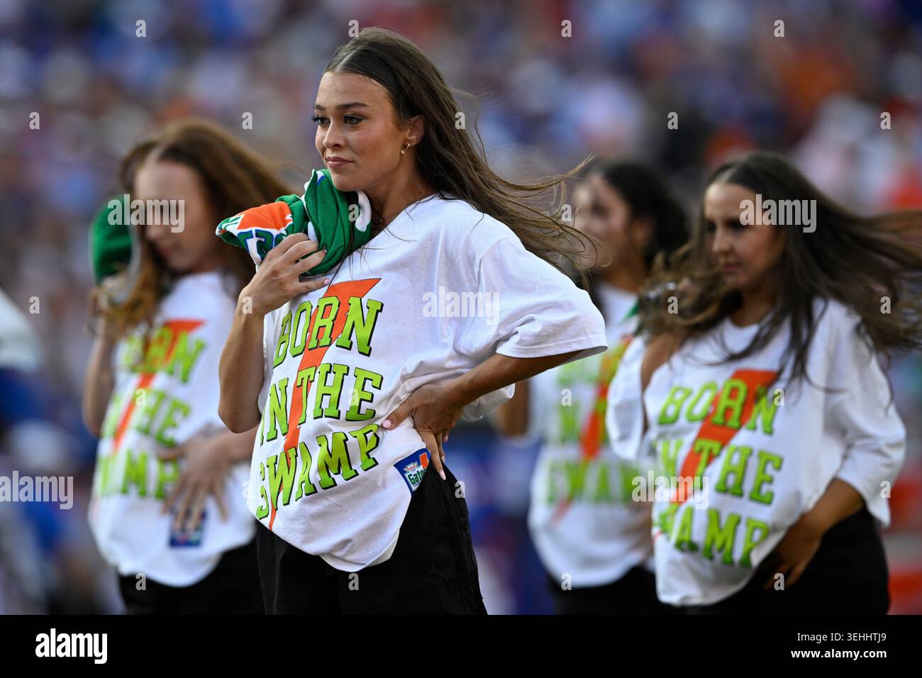 Florida dancers perform on the field during the second half of an NCAA ...