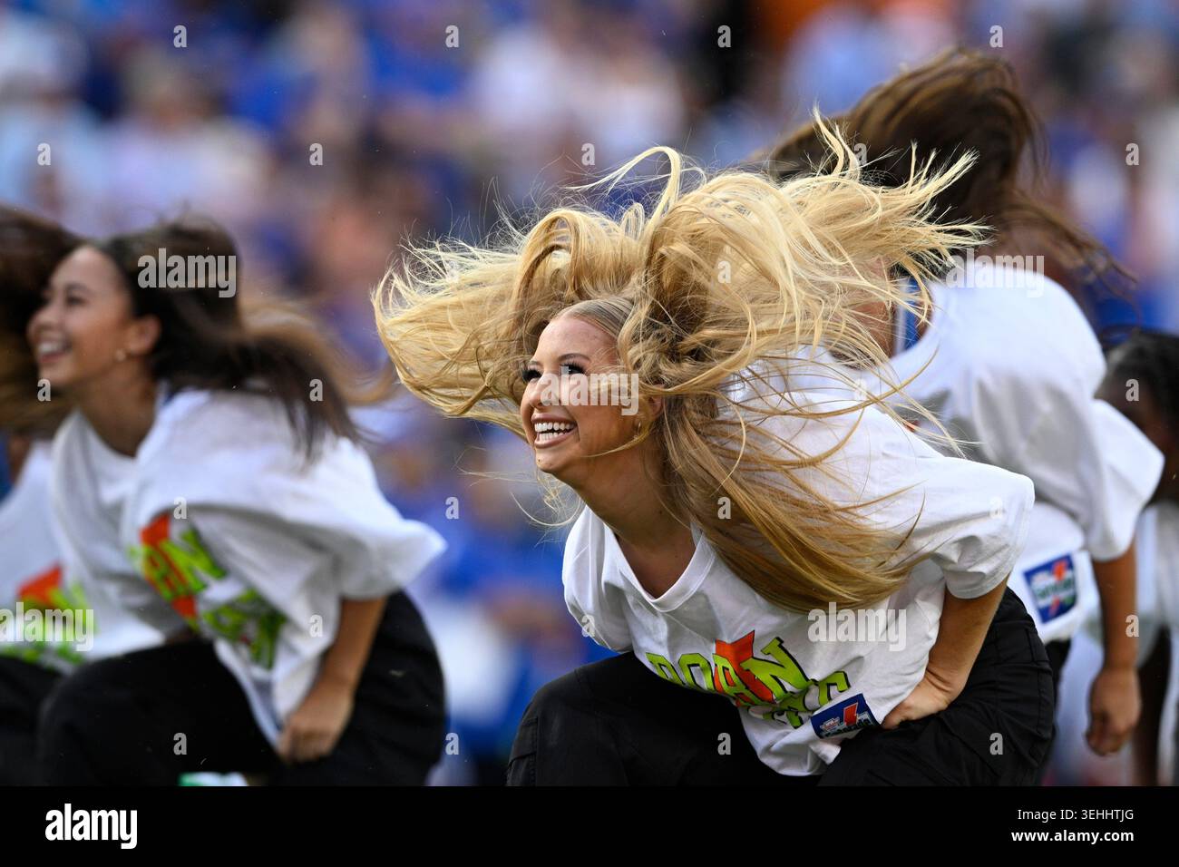 Florida dancers perform on the field during the second half of an NCAA ...