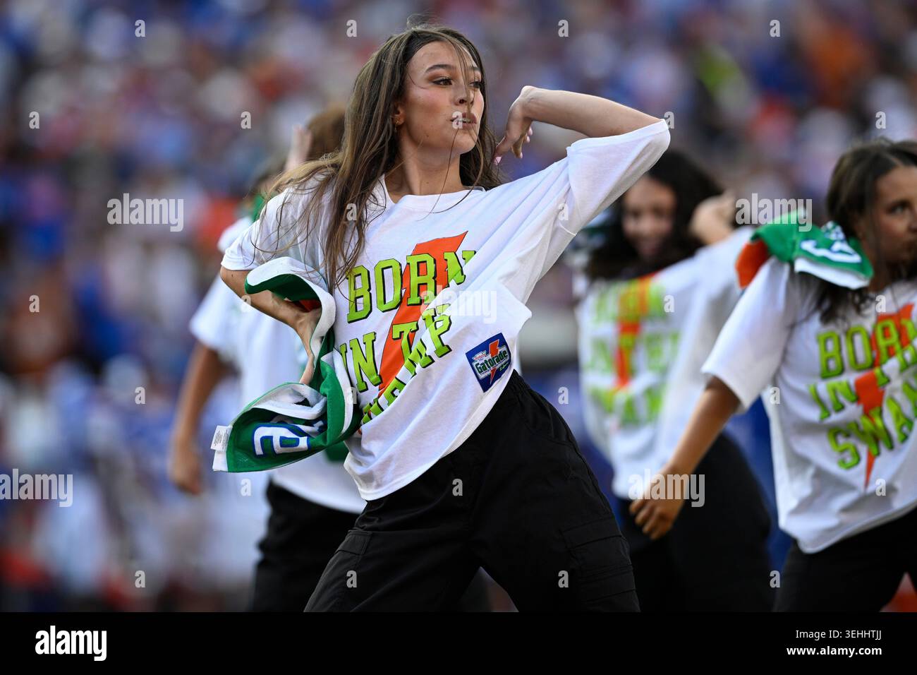 Florida dancers perform on the field during the second half of an NCAA ...
