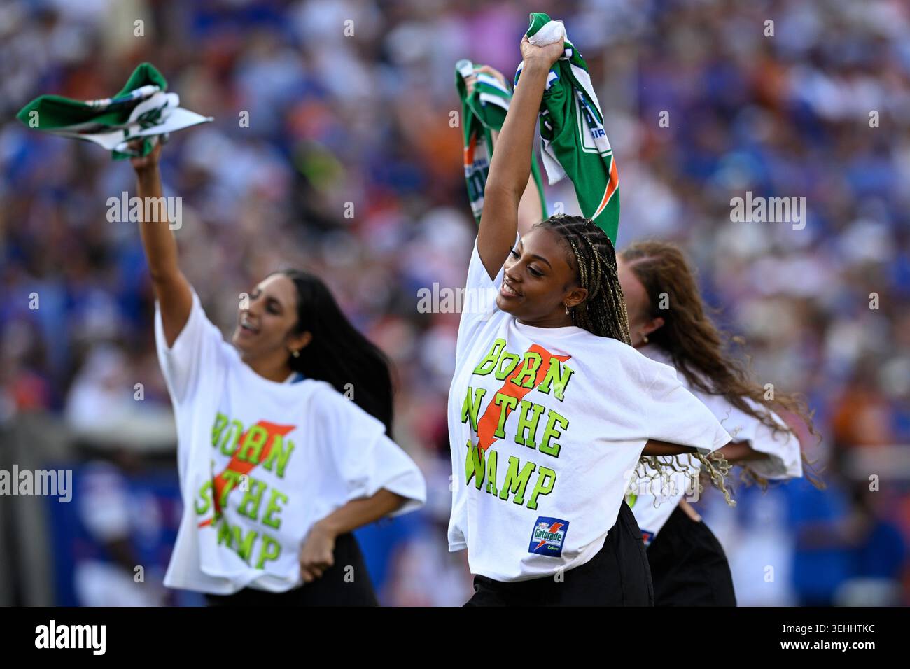 Florida dancers perform on the field during the second half of an NCAA ...
