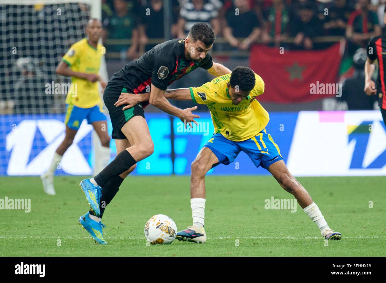 Anas Bach of AS FAR fights for the ball with Tashreeq Matthews of ...