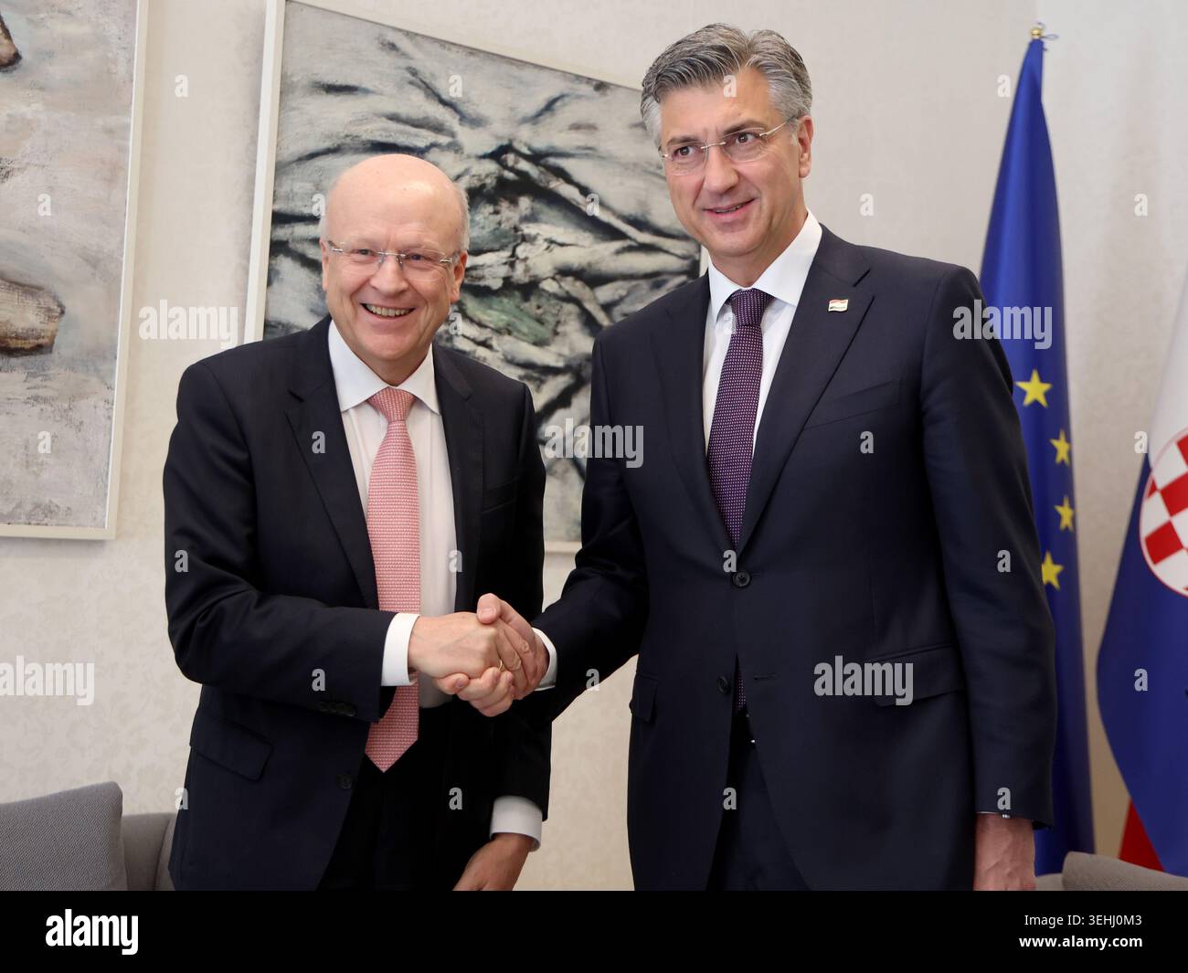 Prime minister of Croatia Andrej Plenkovic shake hands with President ...