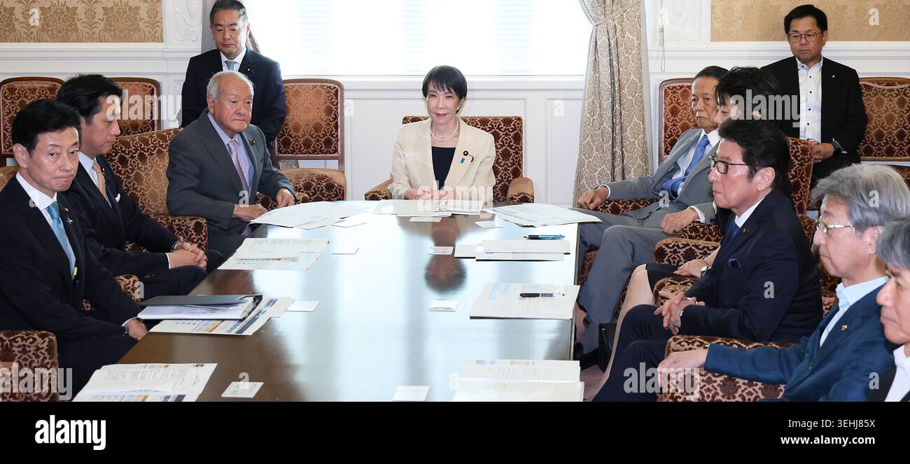 Japanese Prime Minister Sanae Takaichi, center, attends a Liberal ...