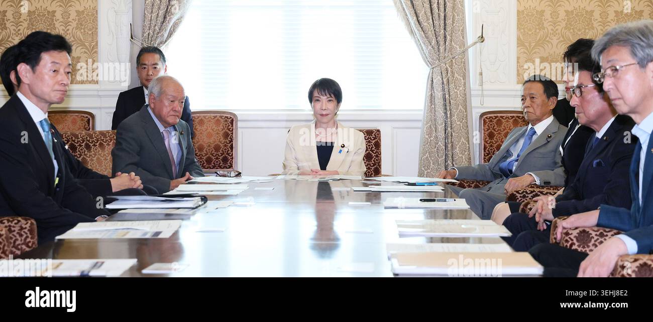 Japanese Prime Minister Sanae Takaichi, center, attends a Liberal ...