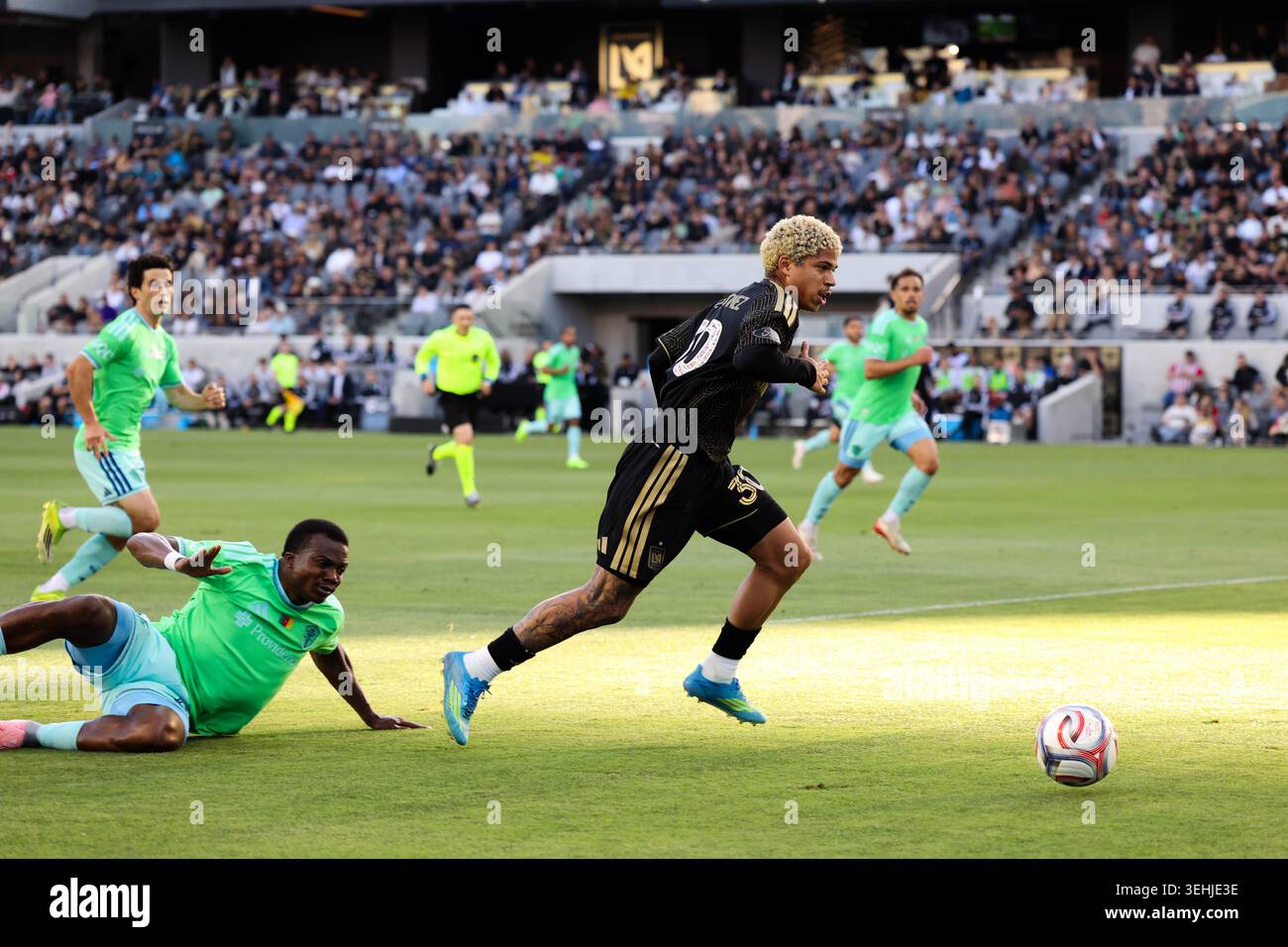 LAFC Defender David Martinez (30) takes possession of the ball from ...