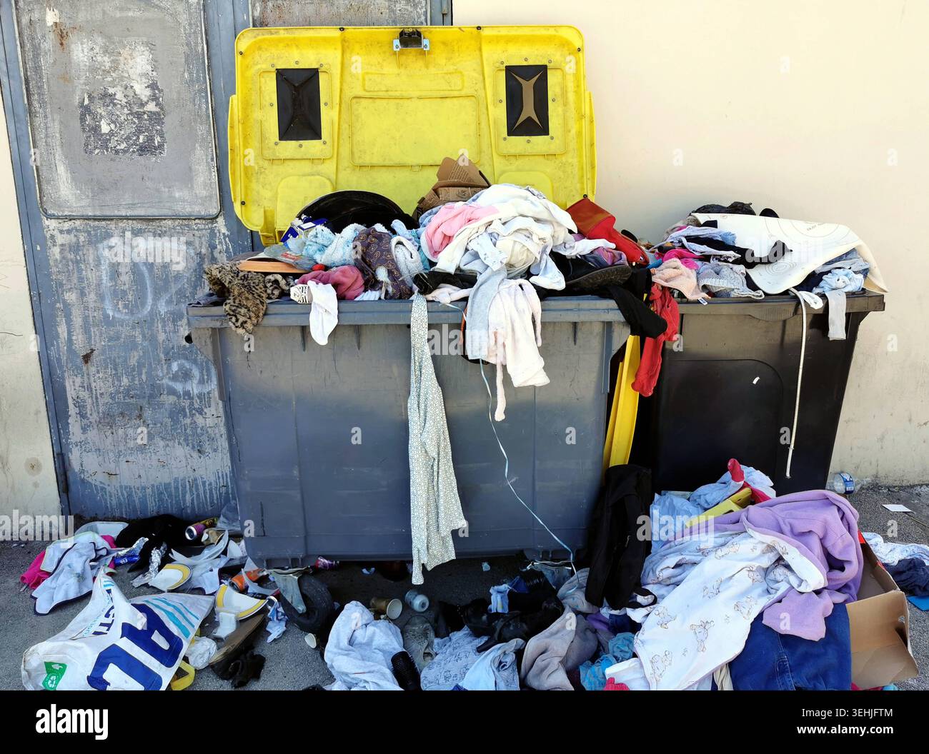 Clothing recycling. Attic sale Bsip 016949 001 Stock Photo - Alamy