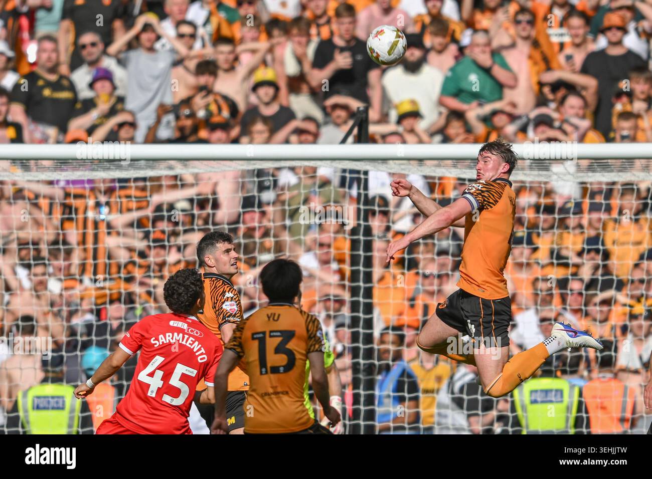 Charlie Hughes of Hull City heads away a dangerous ball during the Sky ...