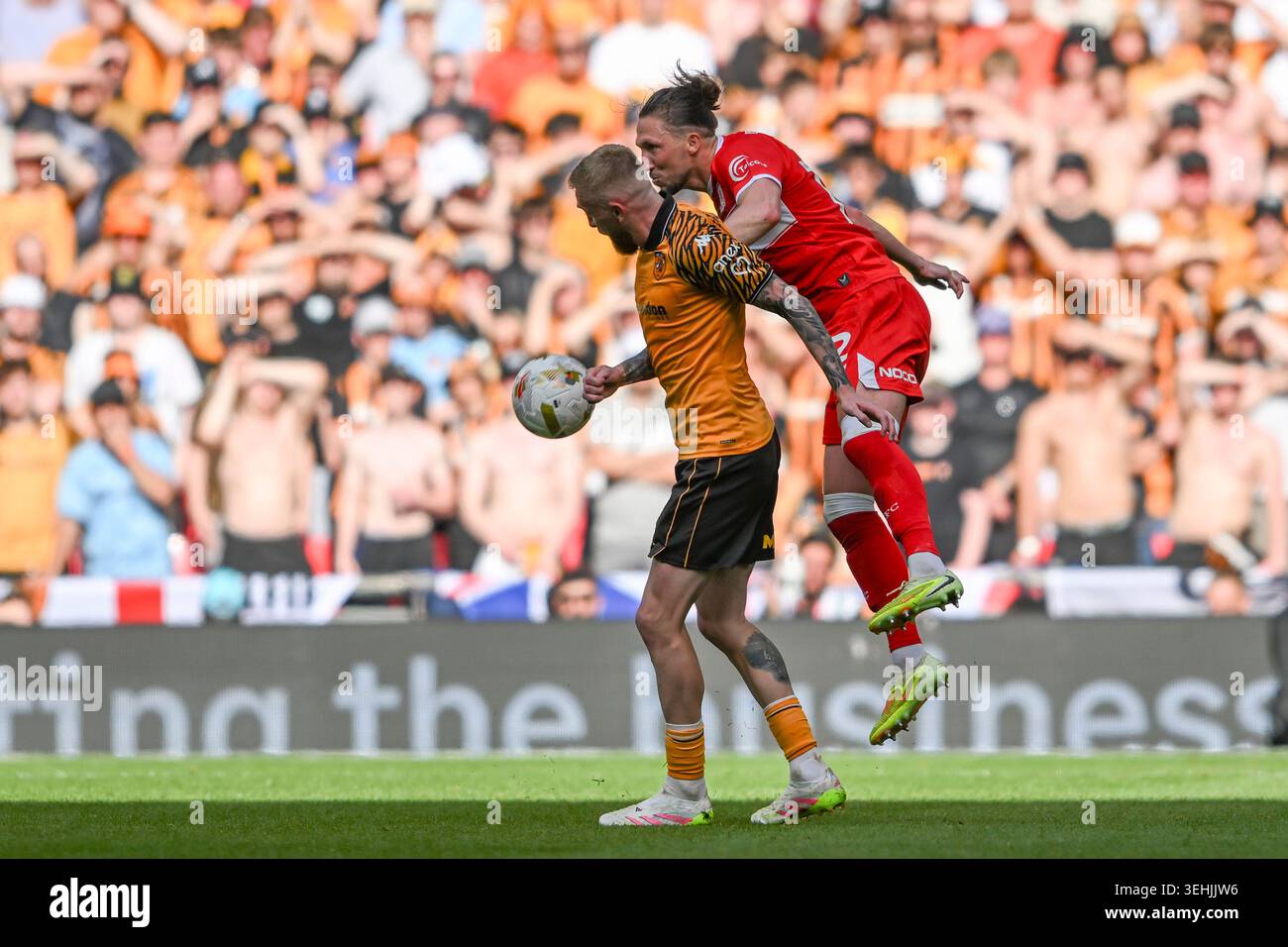 Luke Ayling of Middlesbrough challenges for the ball with Oliver ...