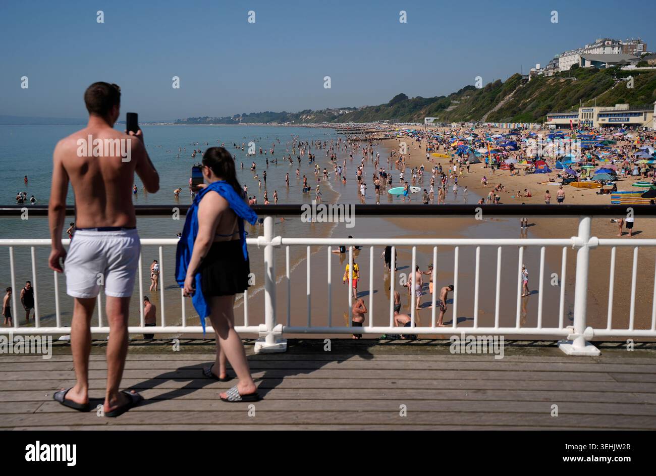 People enjoy the hot weather on Bournemouth beach in Dorset. Monday is ...