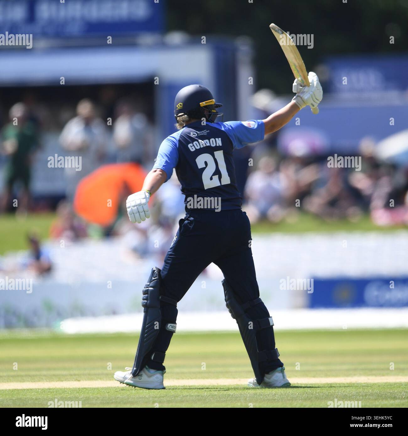 Canterbury, England. 25th May 2026. Amy Gordon raises her bat after ...