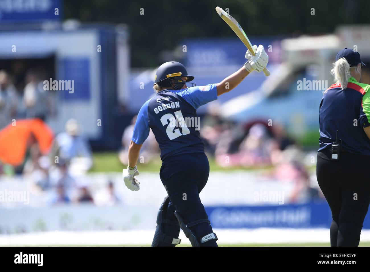 Canterbury, England. 25th May 2026. Amy Gordon raises her bat after ...