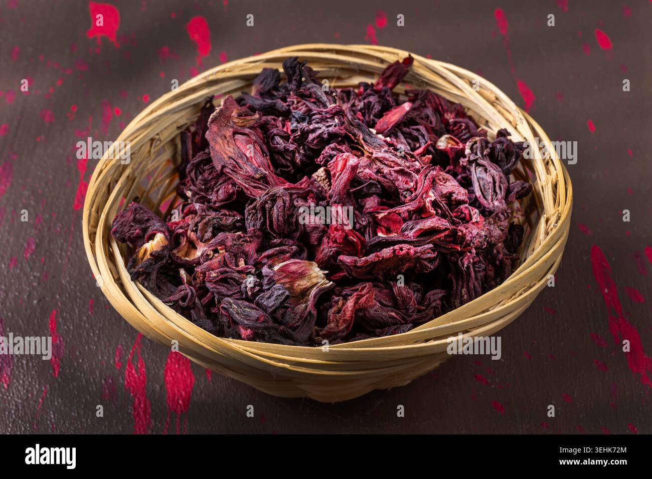 Dried Roselle Hibiscus sabdariffa calyces are contained within a woven ...