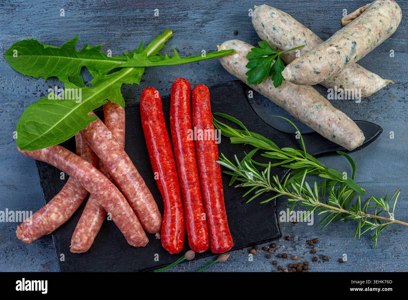 Various raw sausages, including white, red, and pink varieties, are ...
