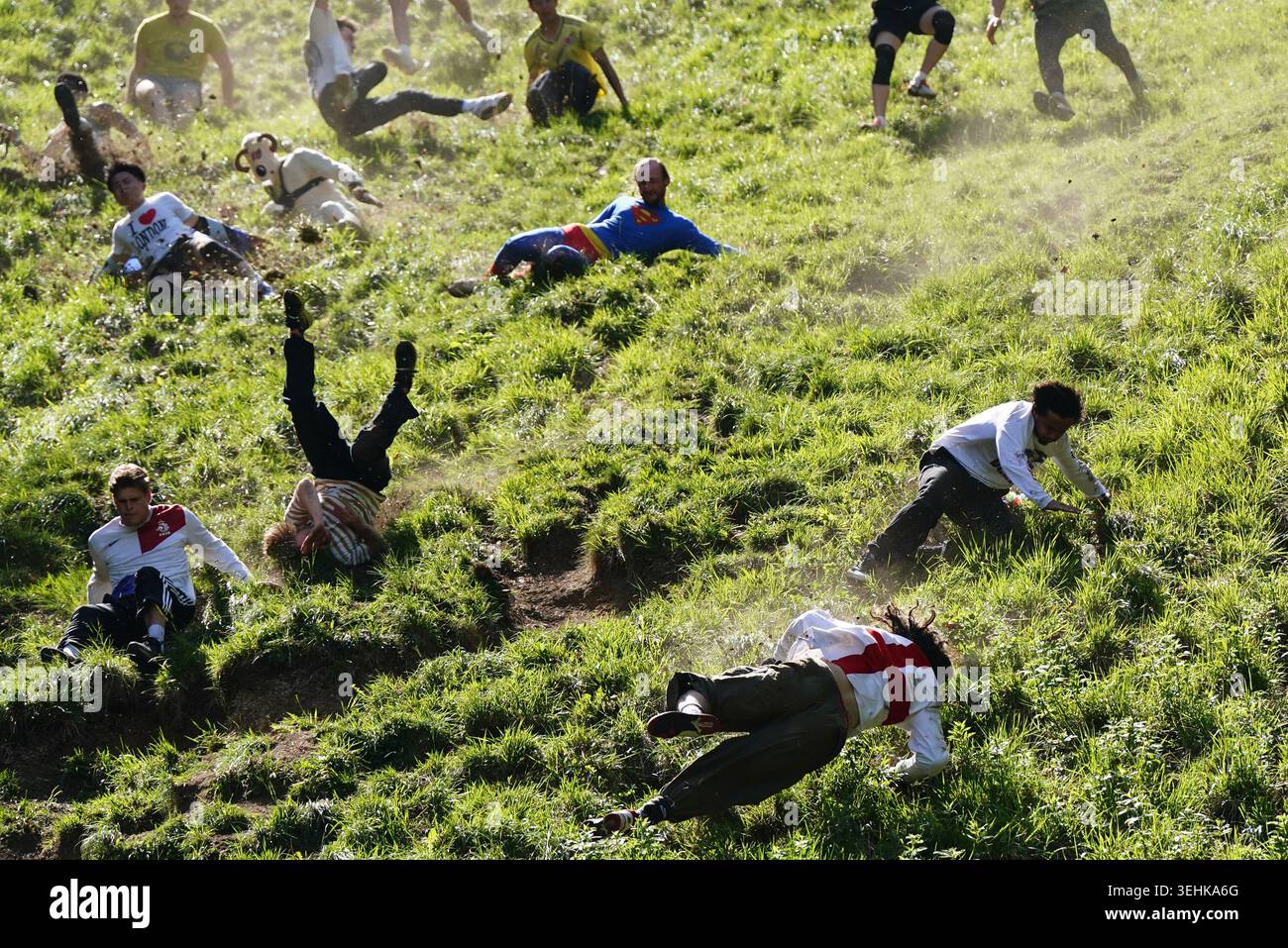 Participants take part in the second men's downhill race during the ...