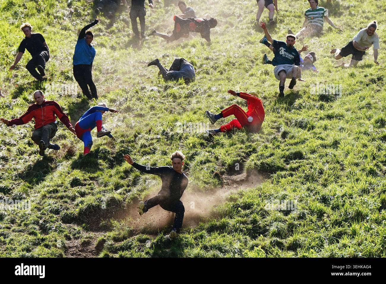 Participants take part in the third men's downhill race during the ...