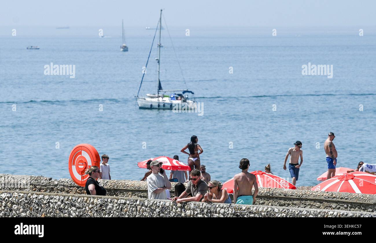 Brighton UK 25th May 2026 - Crowds flock to Brighton beach to enjoy the ...