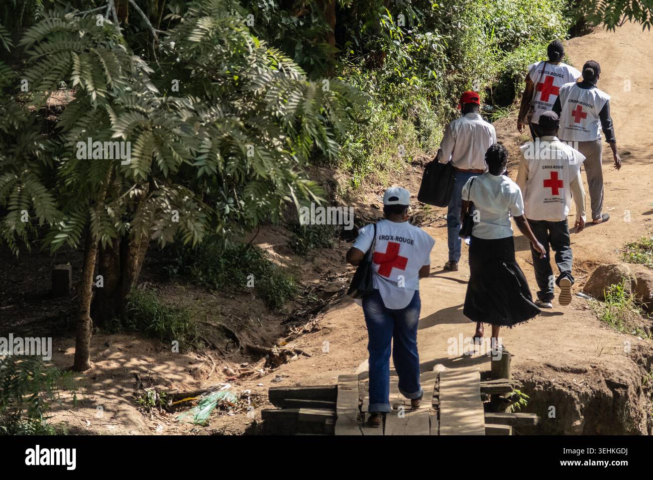 Red Cross volunteers on an outreach to speak to people during a public ...