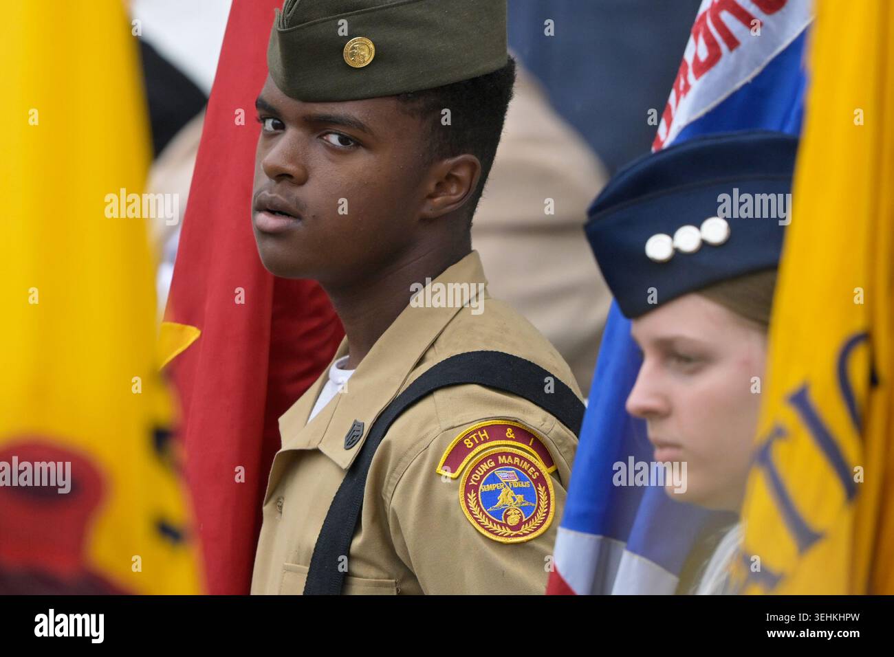 Honor guards are seen standing in place before the beginning of a ...