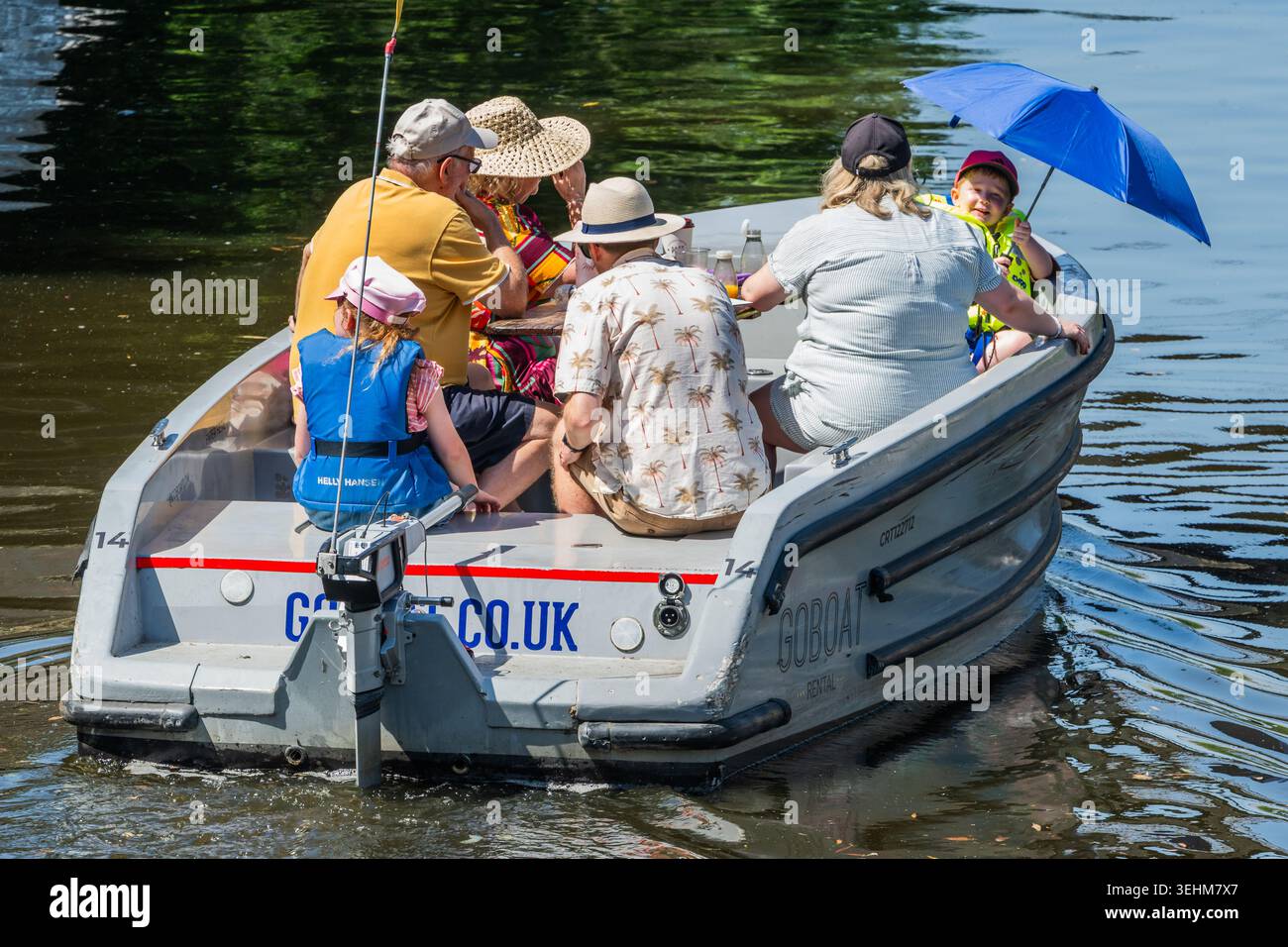 London, UK. 25 May 2026. Umbrellas as parasols on the hire boats on the ...
