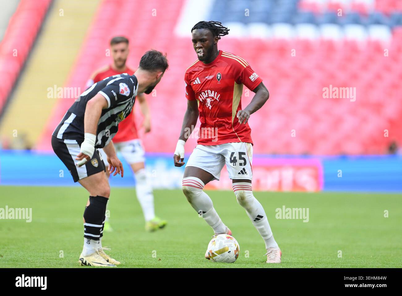 Rosaire Longelo of Salford City in action during the Sky Bet League 2 ...