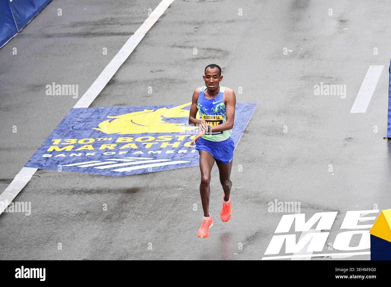 BOSTON, MA - APRIL 18: Mezgebu Sime of Ethiopia runs to the finish line ...