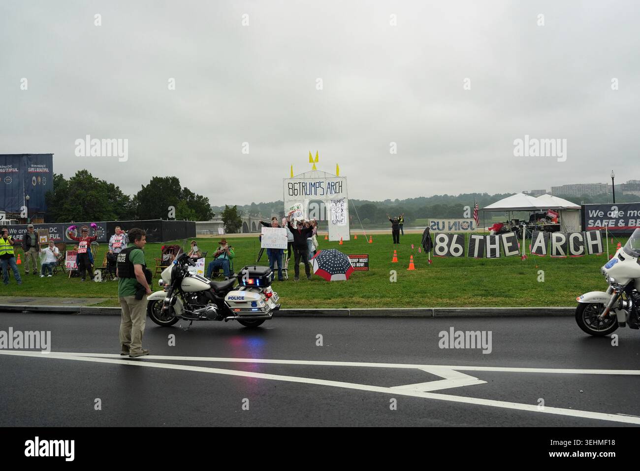 Protesters are pictured along the route as President Donald Trump ...