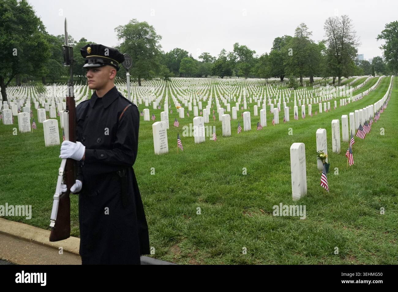 A member of the honor guard stands at attention as President Donald ...