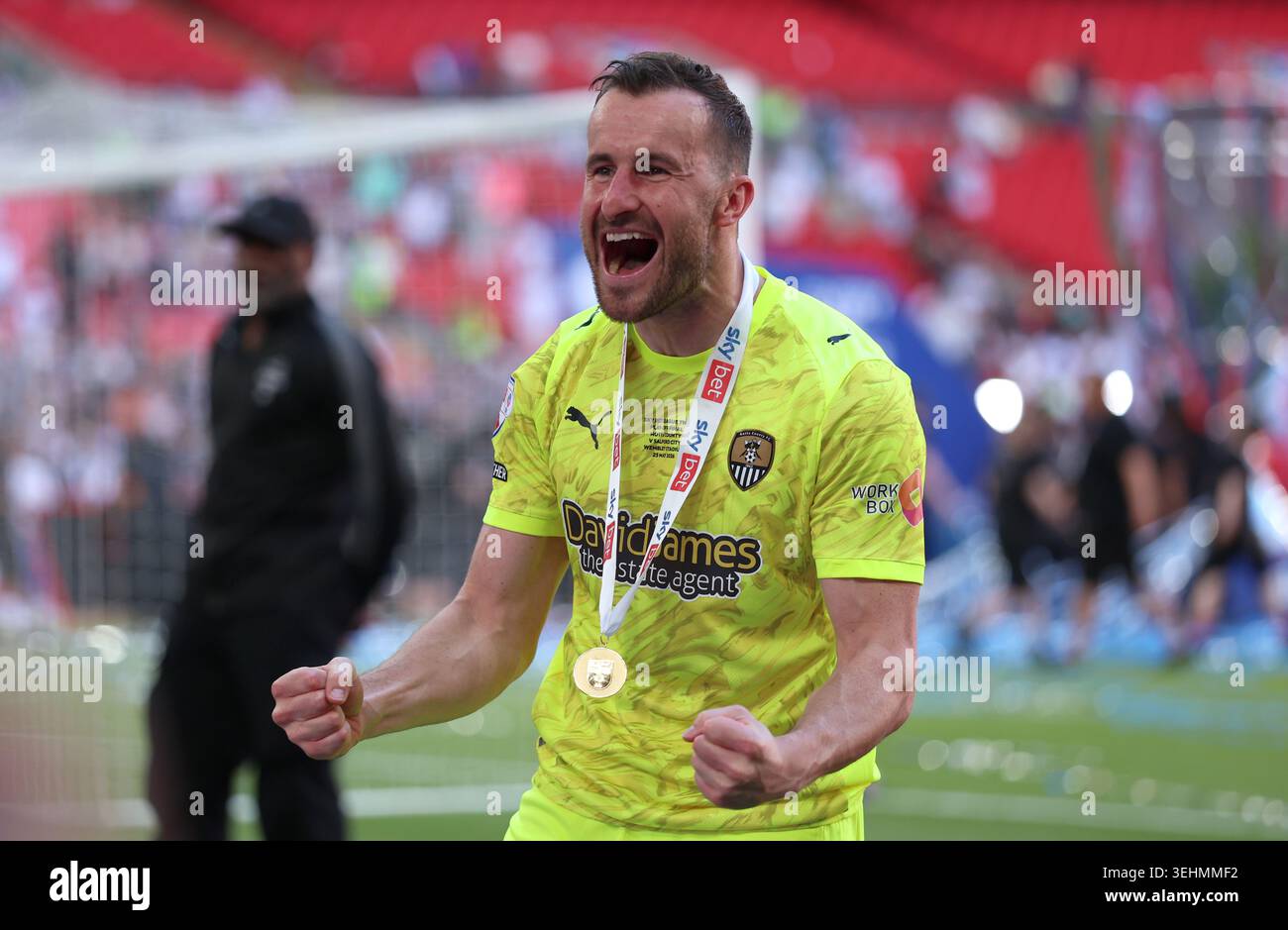 Notts County goalkeeper James Belshaw celebrates promotion after the ...