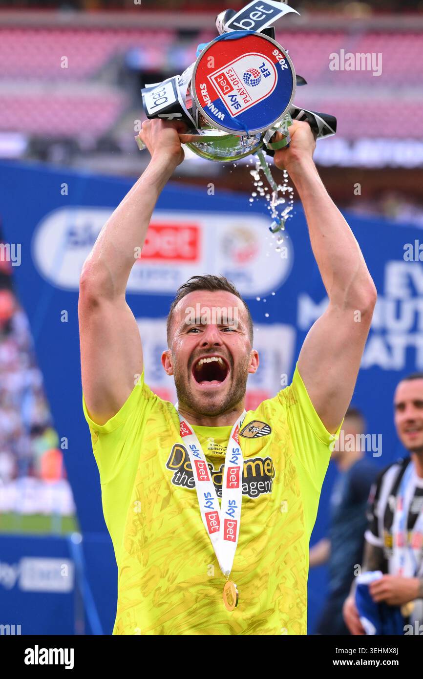 James Belshaw of Notts County celebrates with the trophy during the Sky ...