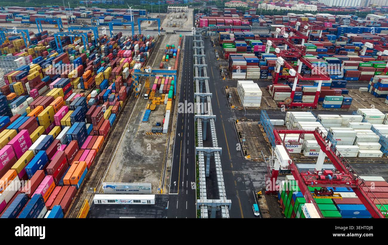 Qingdao Port in east China's Shandong bustles with activity on 26 May ...