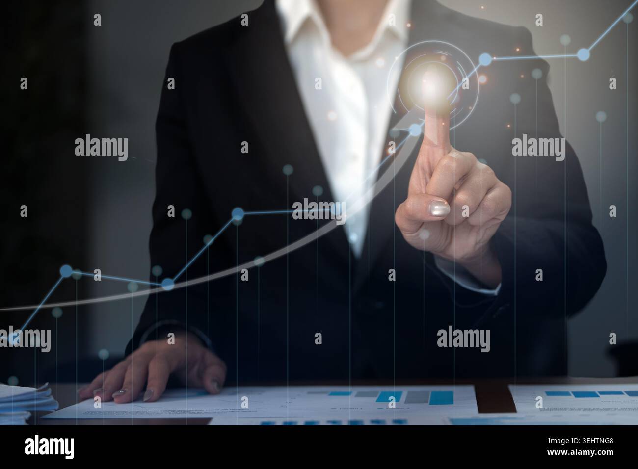 Business professional touching digital growth chart for financial ...