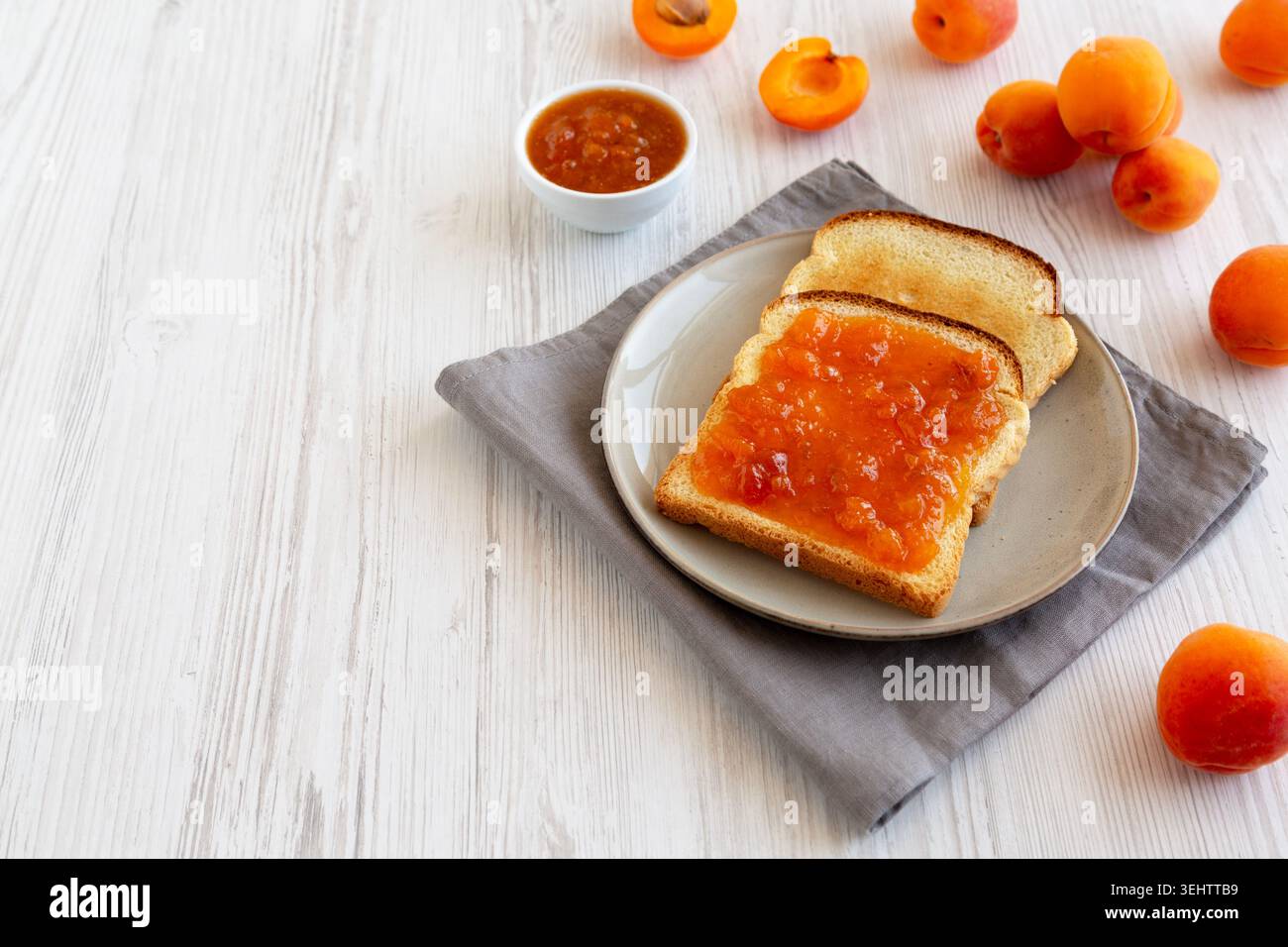 Sweet Homemade Apricot Jam on Toast for Breakfast Stock Photo - Alamy
