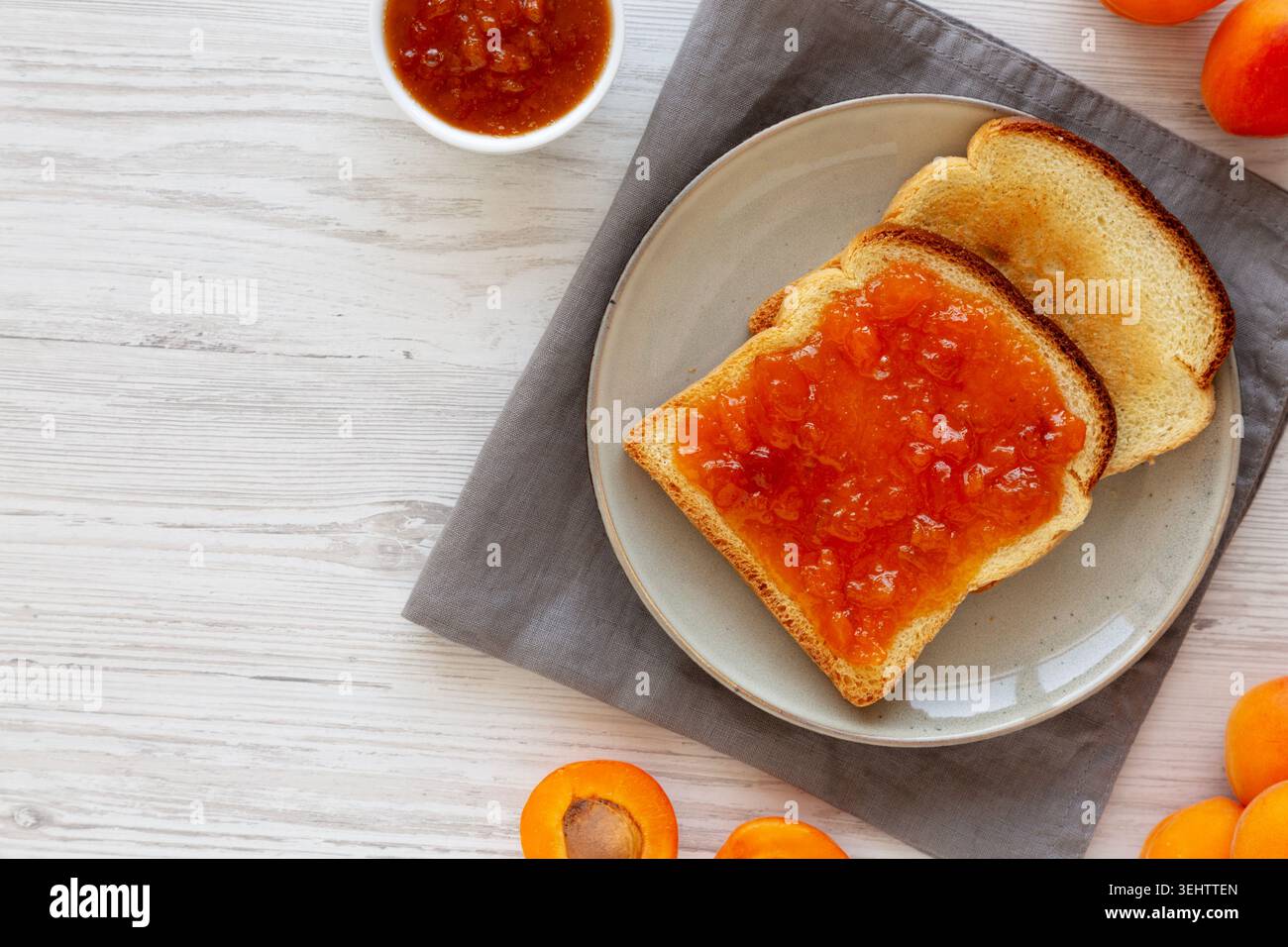 Sweet Homemade Apricot Jam on Toast for Breakfast Stock Photo - Alamy