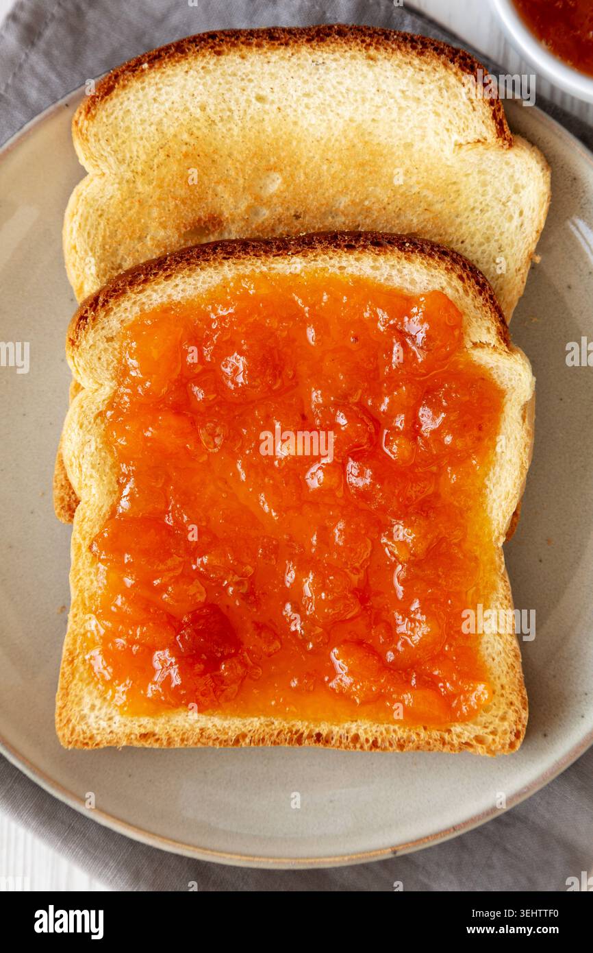 Sweet Homemade Apricot Jam on Toast for Breakfast Stock Photo - Alamy