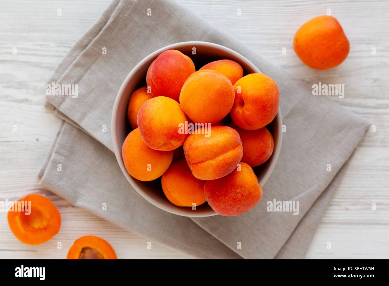 Raw Organic Apricots in a Bowl, top view. Flat lay, overhead, from ...