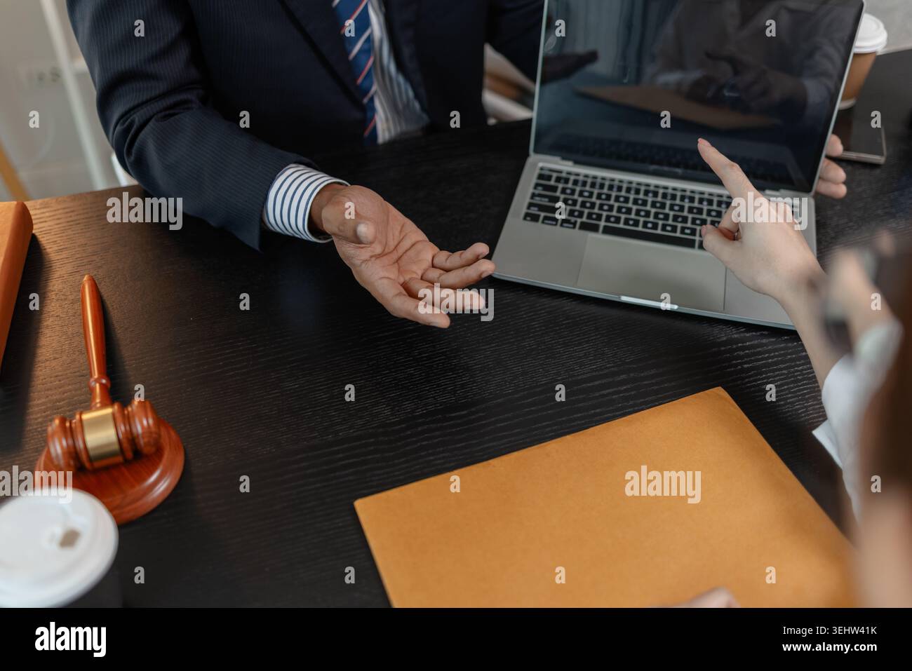 Professional legal consultation meeting between lawyer and client in ...